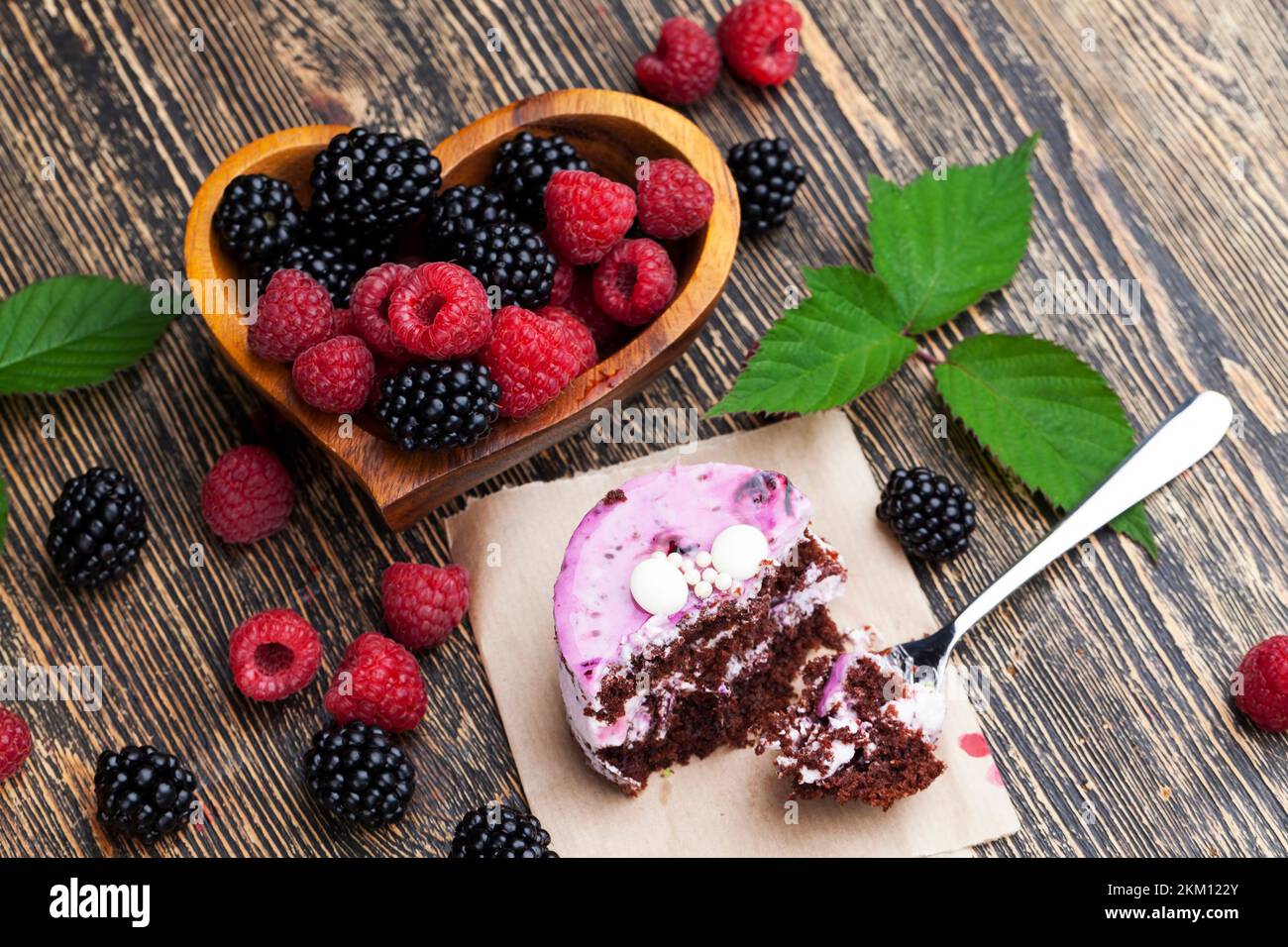 berry cake with chocolate cakes and butter cream with berry jam, there ...