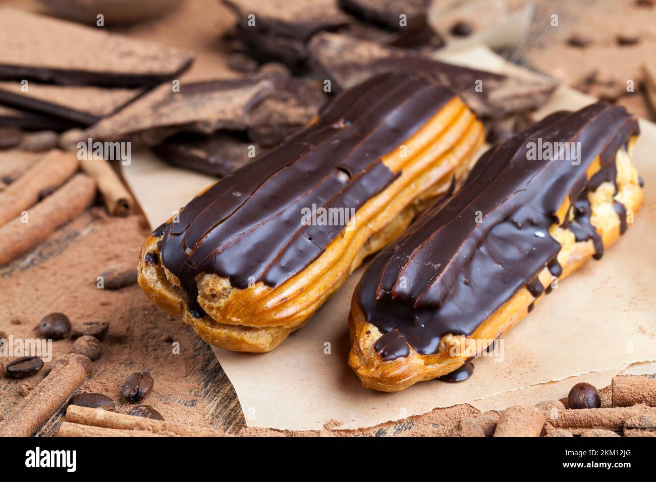 chocolate covered custard eclair with creamy chocolate cream, custard ...