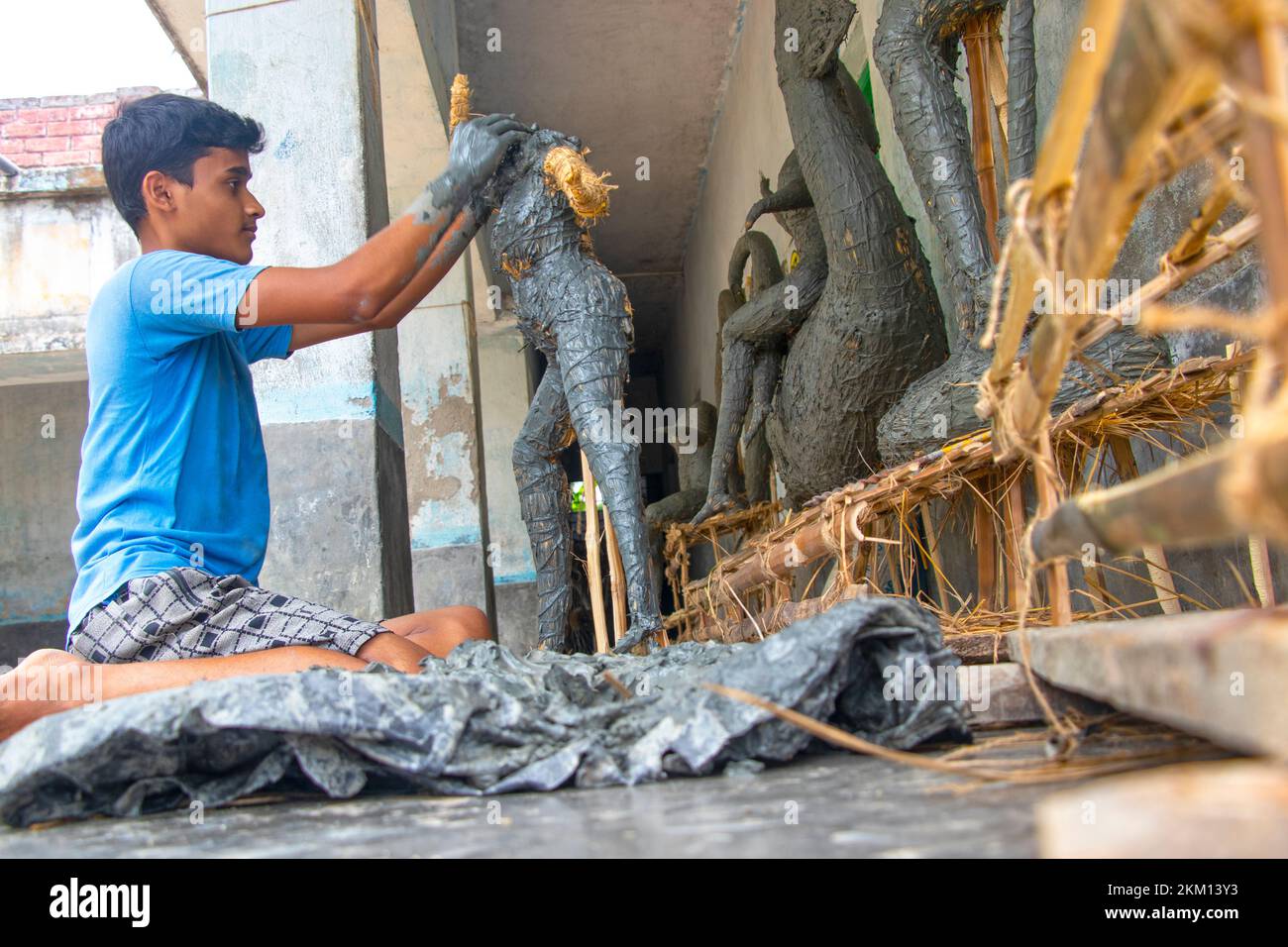 Indian Boy Making Idol Goddess Stock Photo - Alamy
