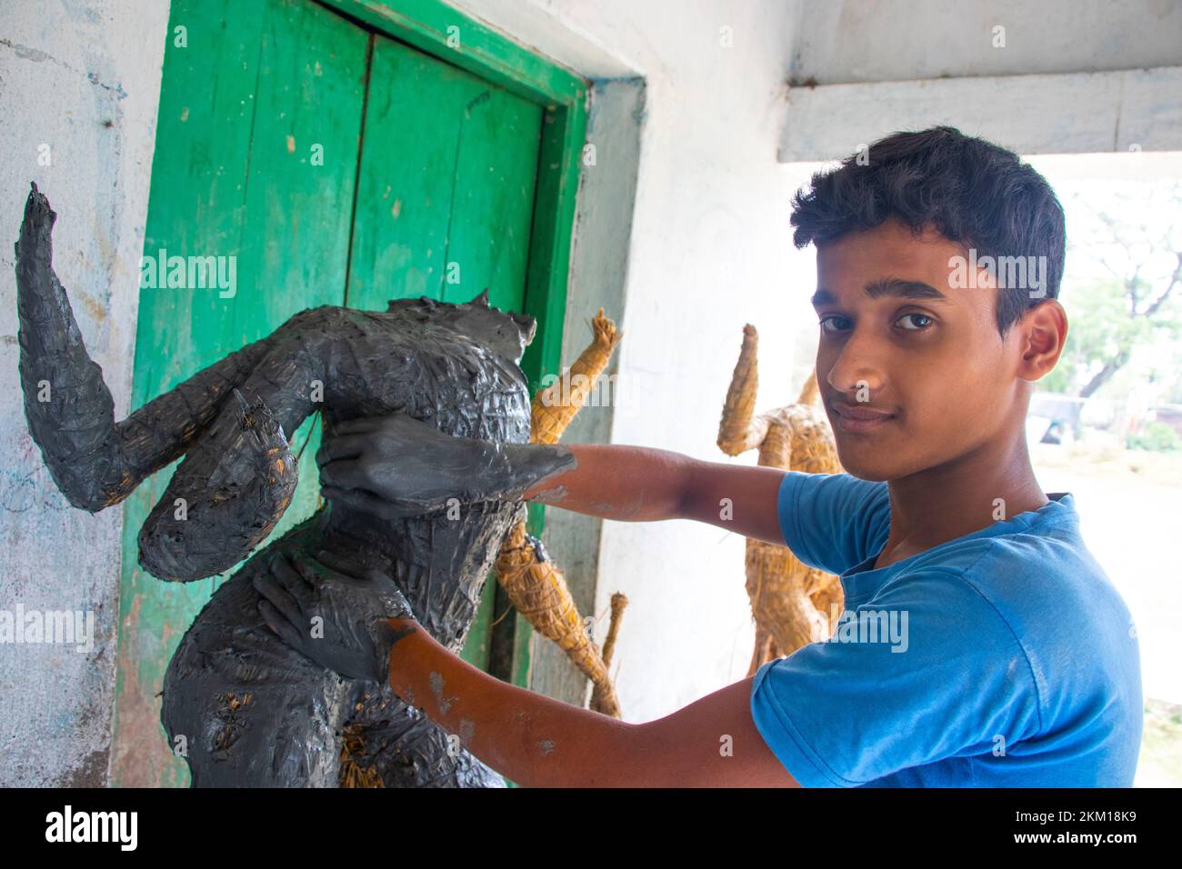 Indian Boy Making Idol Goddess Stock Photo - Alamy