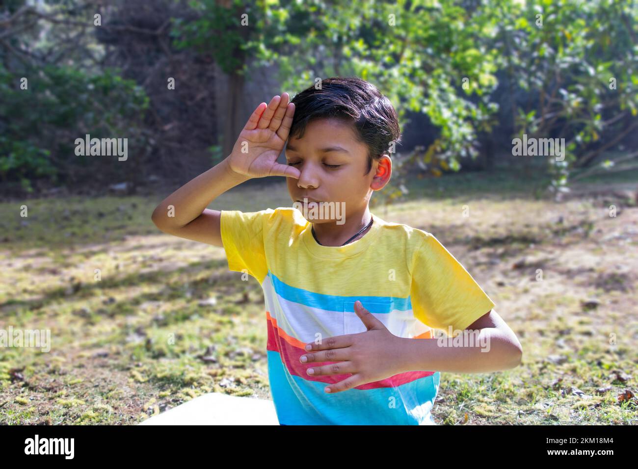 Indian children doing yoga hi-res stock photography and images - Alamy