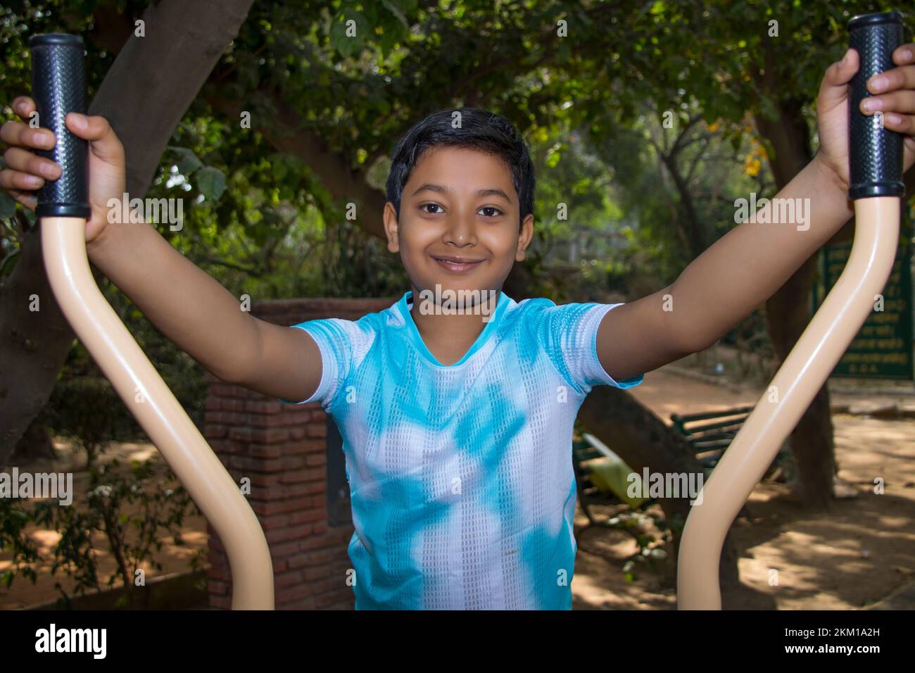 Indian boy exercising hi-res stock photography and images - Alamy