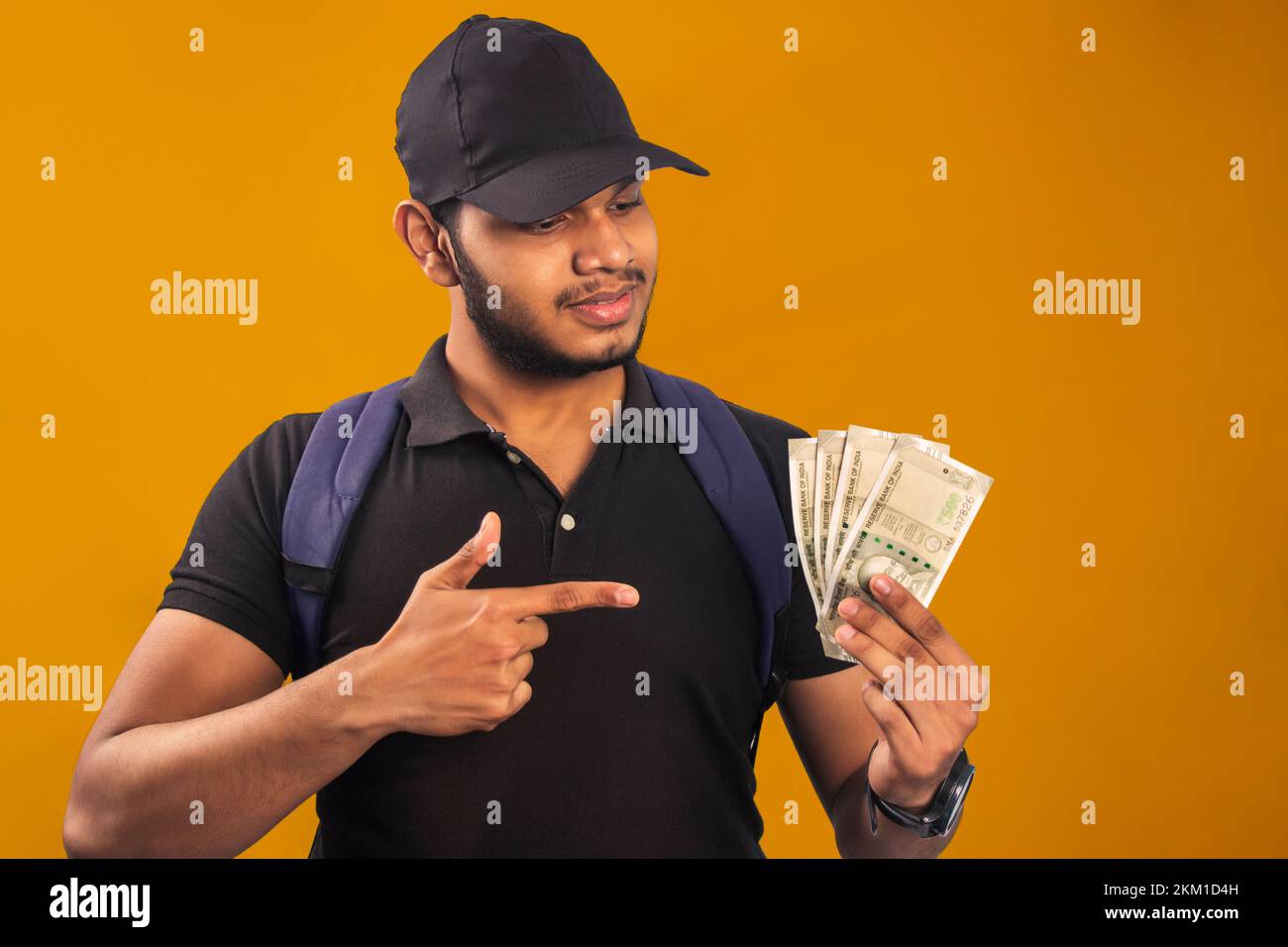 Young Delivery Man Holding Indian Rupee Banknotes Smiling Happy ...