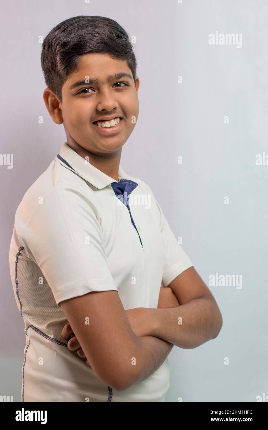 Professional sportsperson standing smiling sportswear looking at camera confidence hi-res stock ...