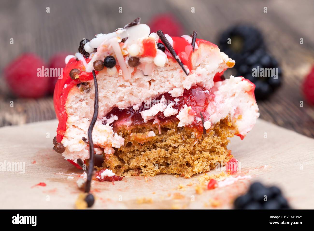 fresh cake with red raspberry jam, sweet cake with berry filling of red ...