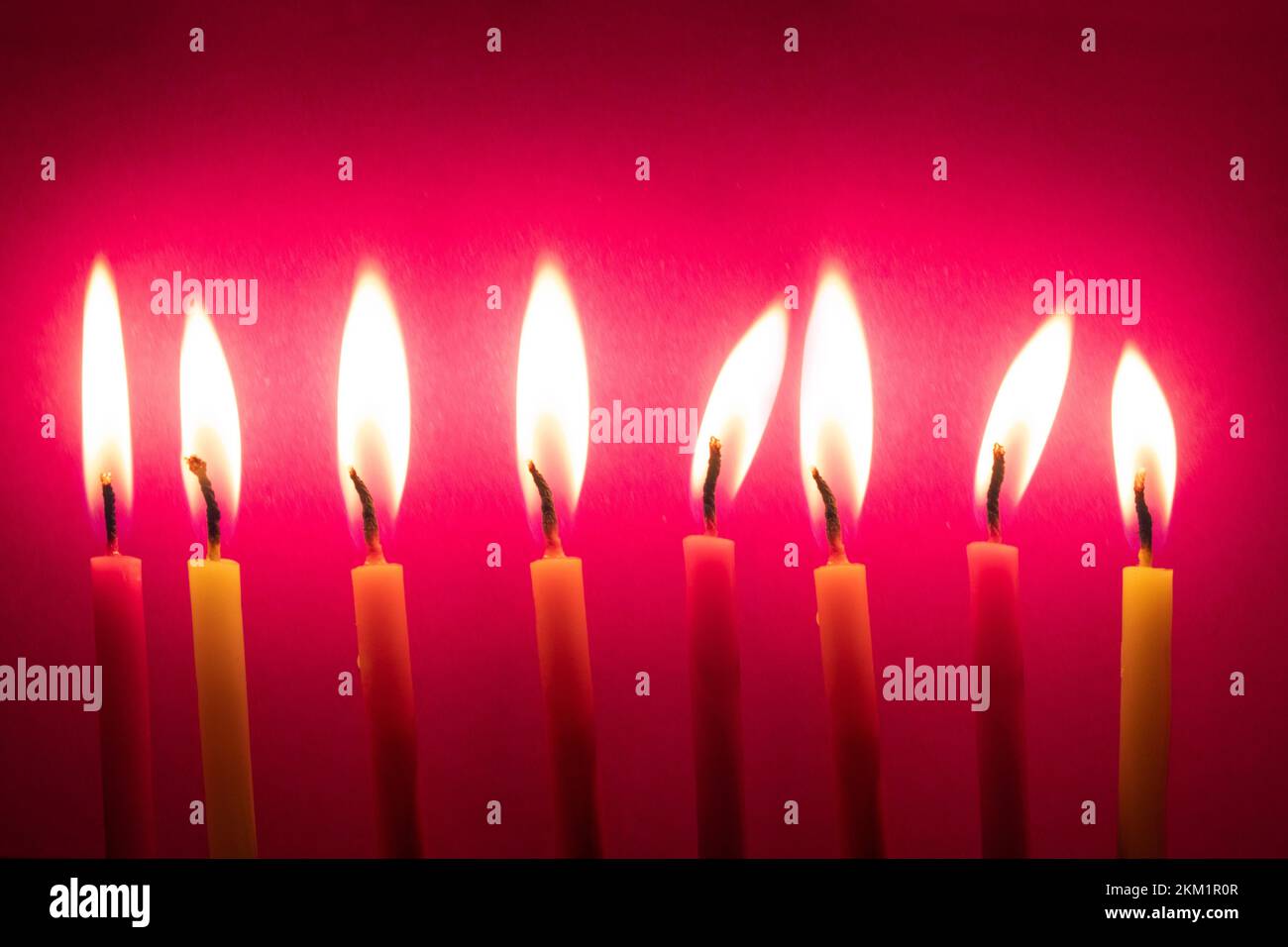 Burning Candles Against Color Background during diwali festival Stock ...