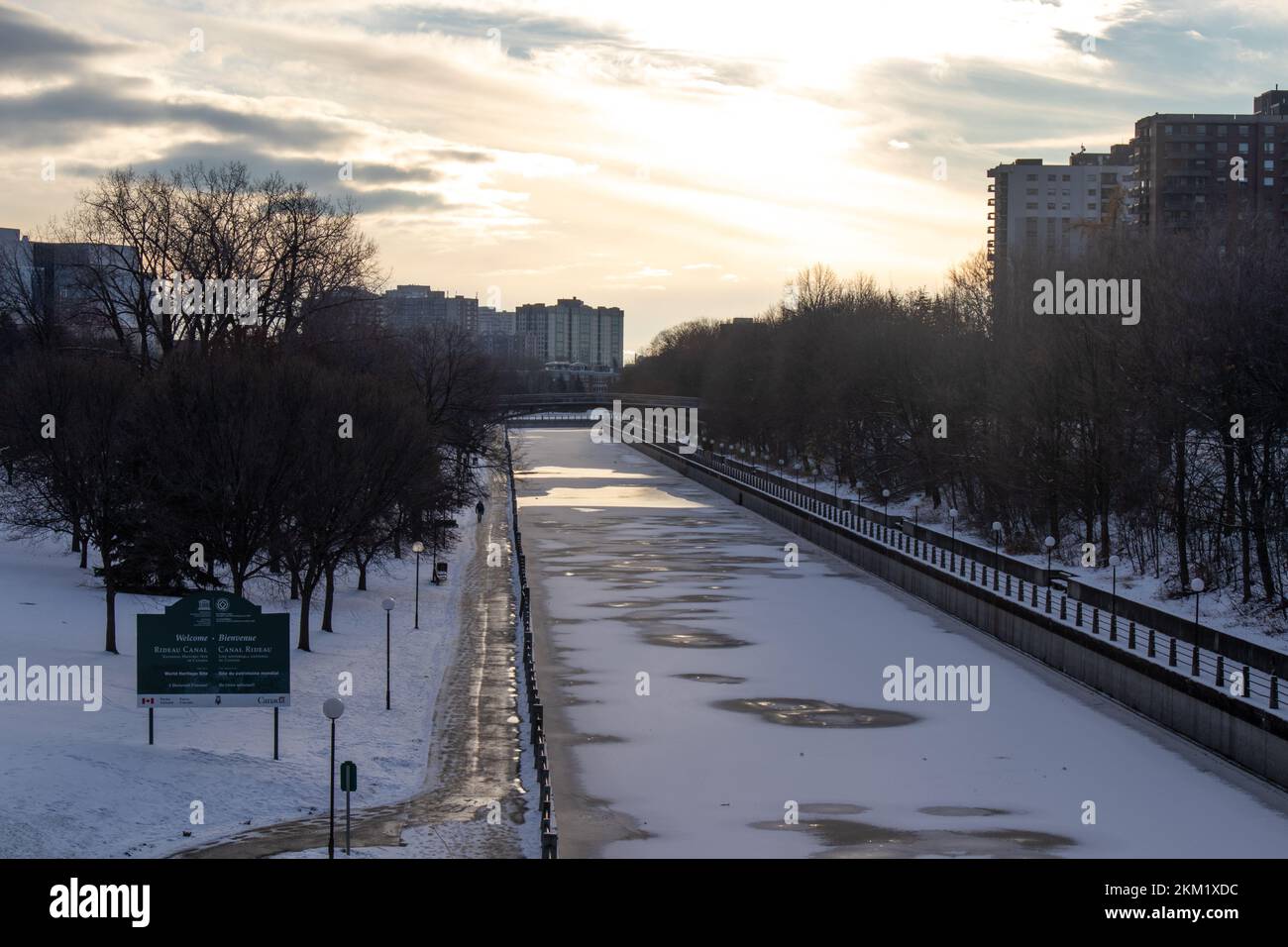 The sun rises on a partly cloudy morning in Ottawa, seen looking over a ...