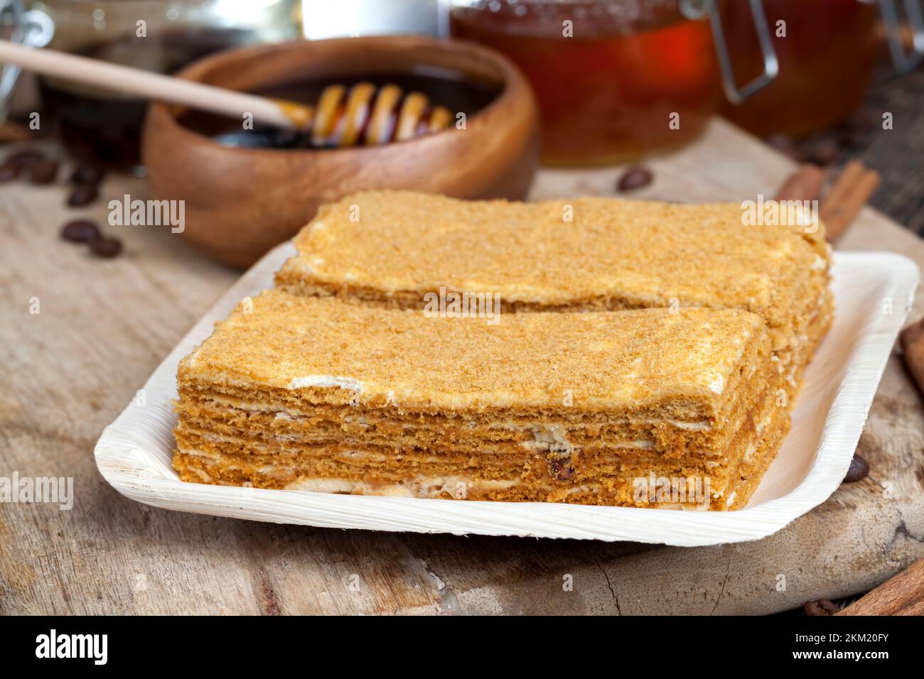 sliced puff pastry of cakes with honey and cream filling, honey cake ...