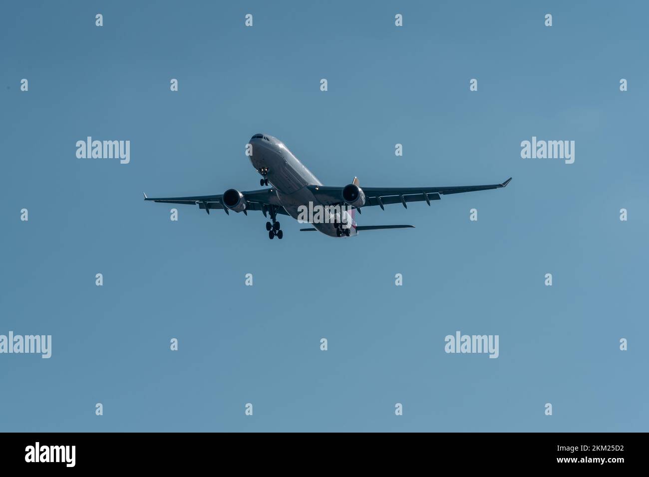 Closeup a commercial passenger aircraft full of tourists approaching ...