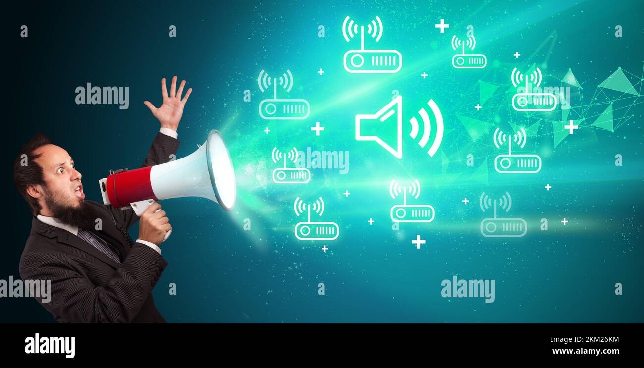 Young person with megaphone and technology related icon Stock Photo - Alamy