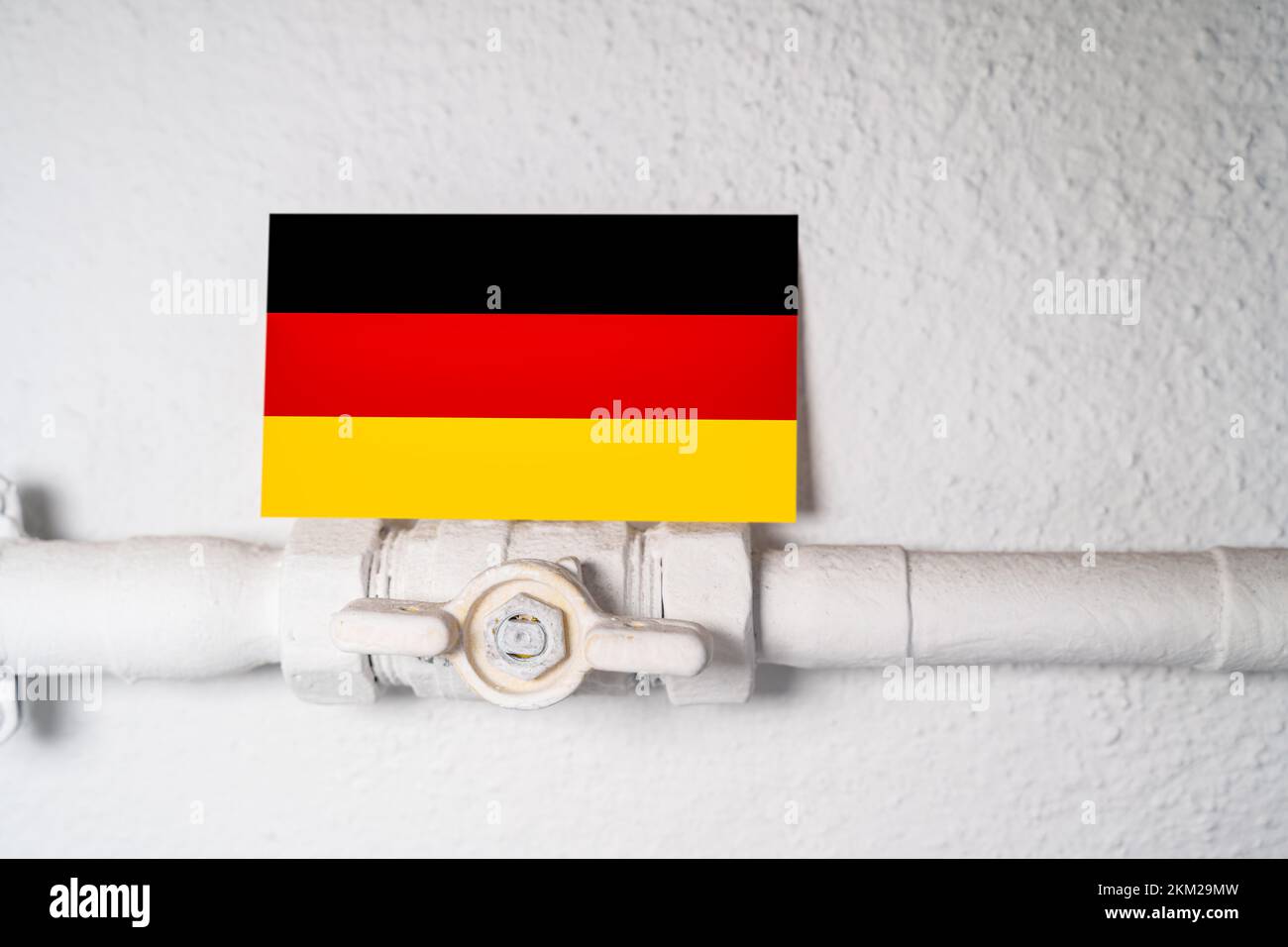 German flag on a gas pipeline symbolizing energy cut-off from Russia to ...