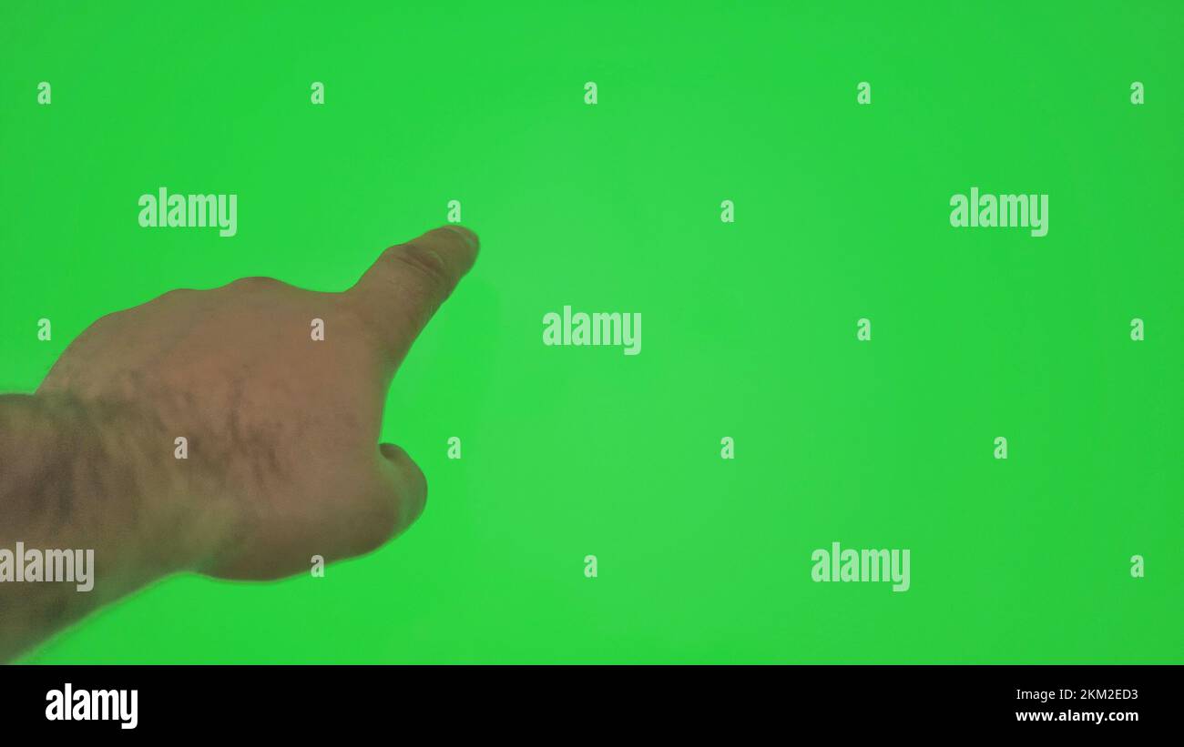 Male hand gestures on green screen: pointing or tapping on the screen ...