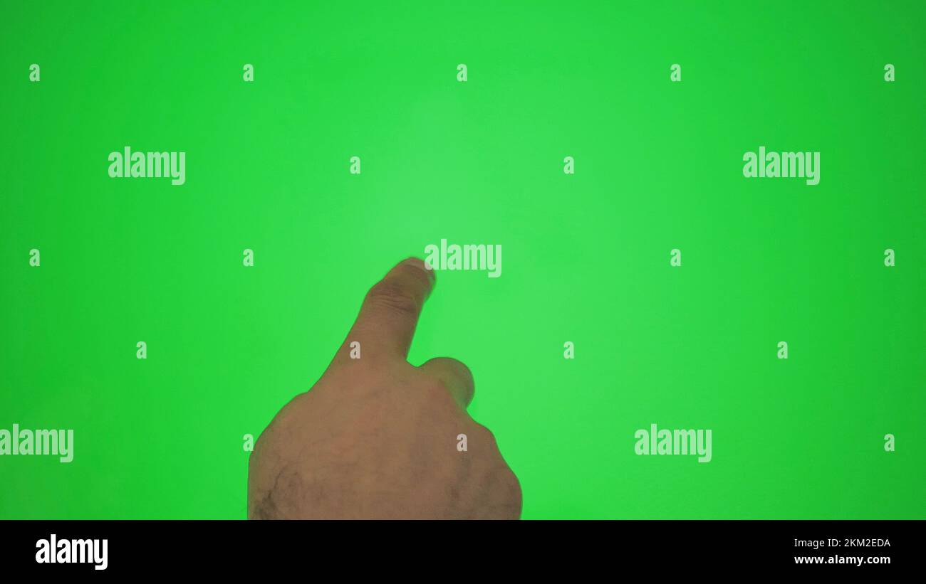Male hand gestures on green screen: pointing or tapping on the screen ...