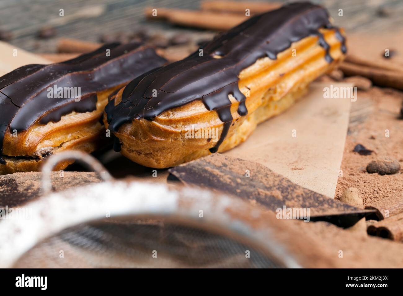 chocolate covered custard eclair with creamy chocolate cream, custard ...