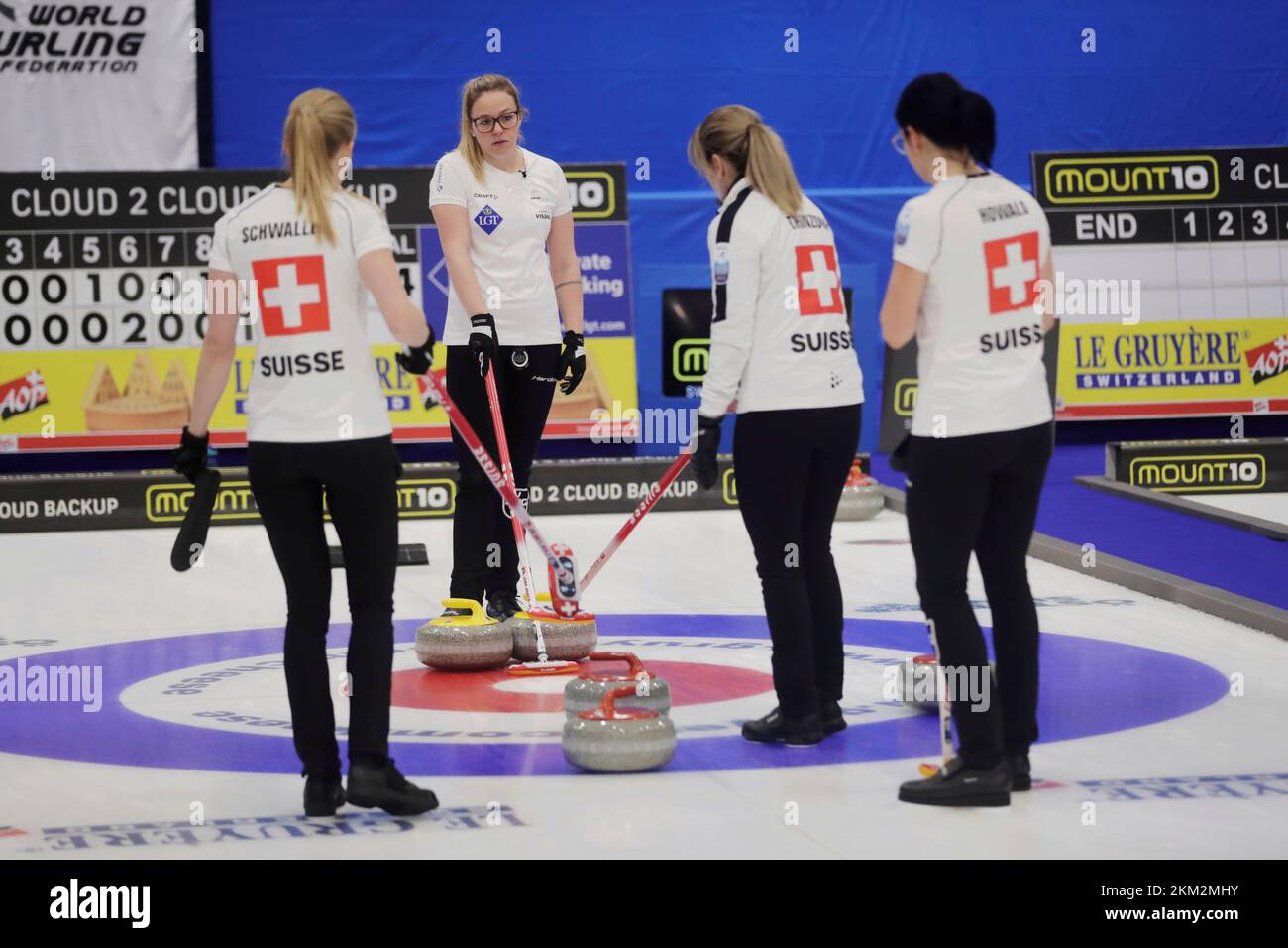 Switzerland team planning the last stones in the women's gold medal ...