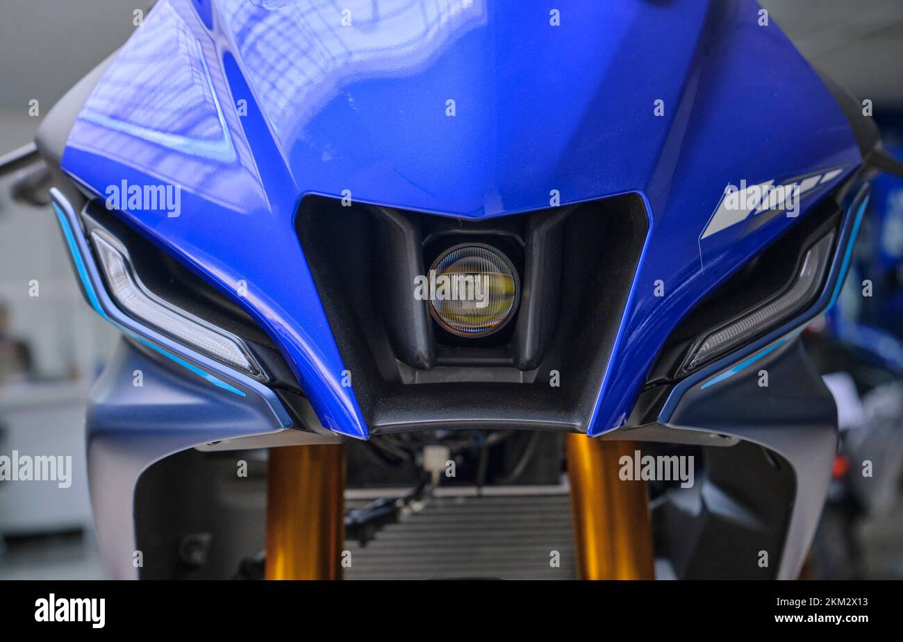 Motorcycles in the showroom Yamaha shop. Yamaha R15 v4 motorcycle ...