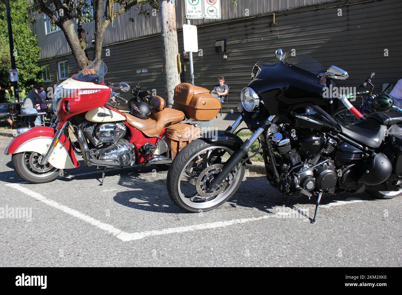 The two motorcycles parked outside Stock Photo - Alamy