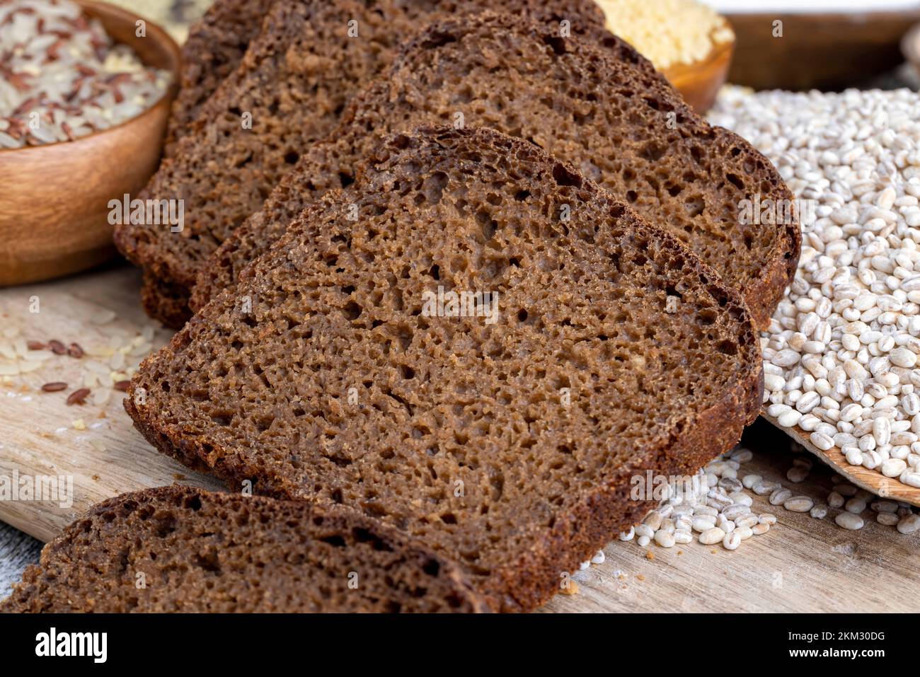 cut fresh bread into pieces while cooking with bread, the bread is cut ...