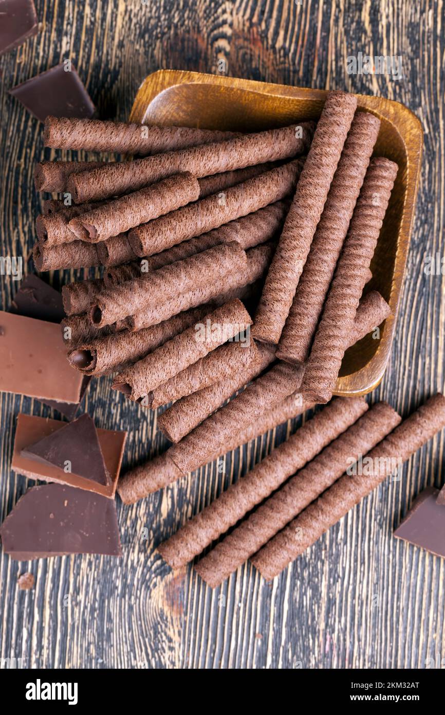 chocolate tubes with chocolate filling, dessert of chocolate waffle ...