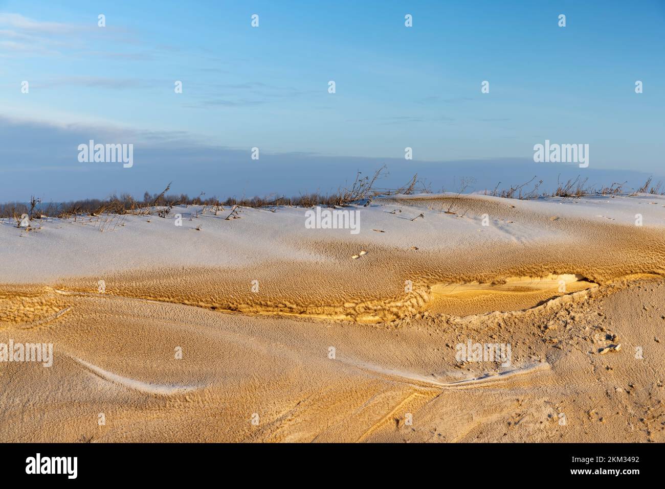 snow covered with a thick layer of dirt and dust in the winter season ...