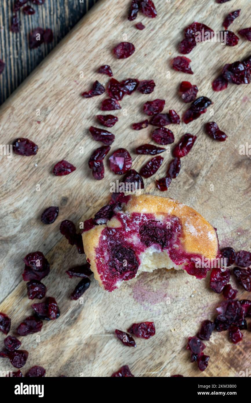 wheat pastries with red cherry strawberry filling on a board, dried ...