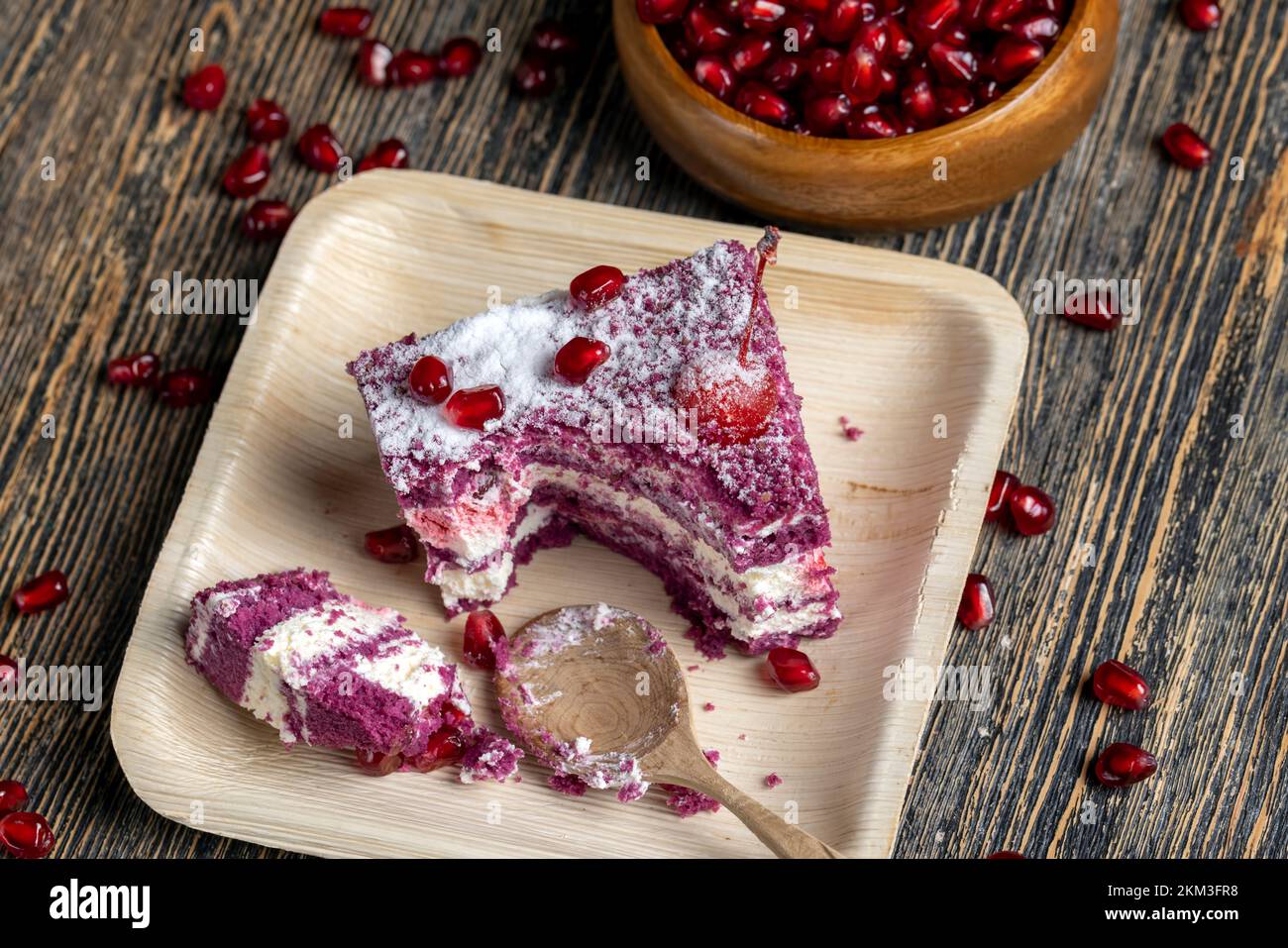 a maroon colored cake with the taste of different berries and a creamy ...