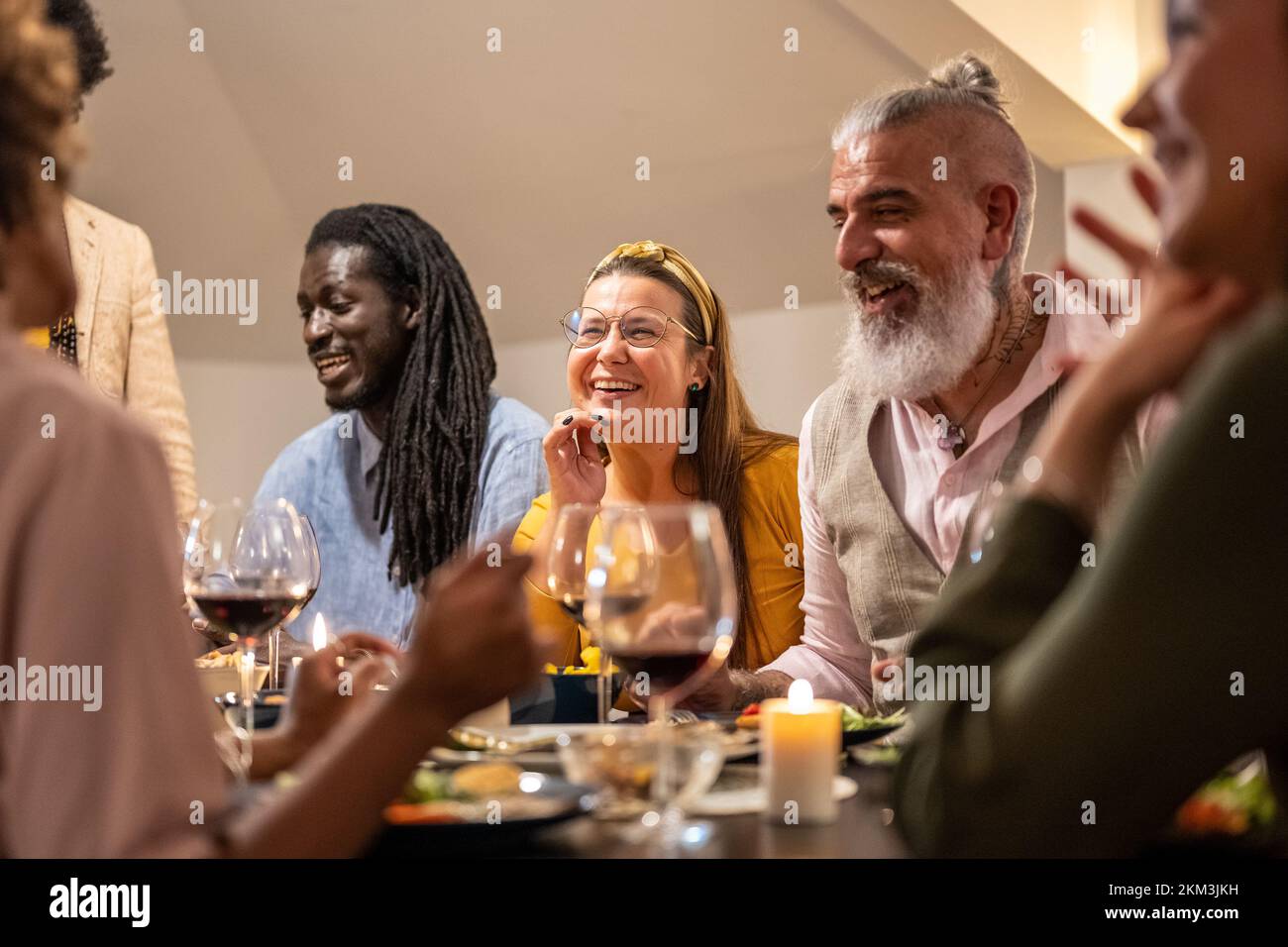 Group of diverse people sharing time and having fun at vegetarian ...