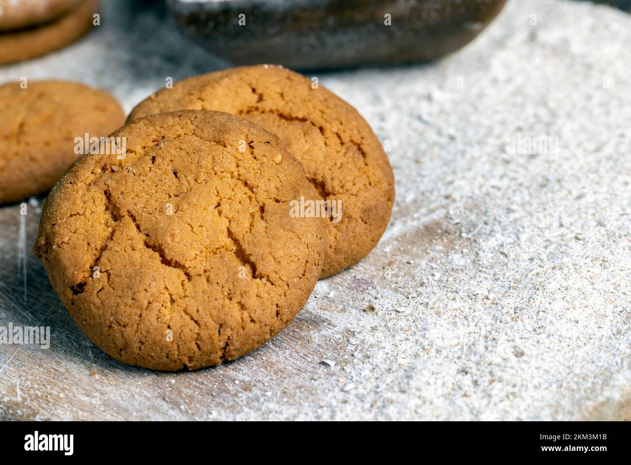 fresh wheat cookies made of white wheat flour on the table, several ...