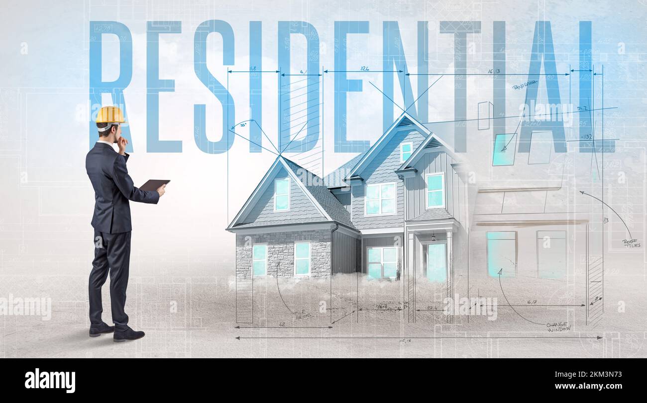 Young engineer holding blueprint concept Stock Photo - Alamy