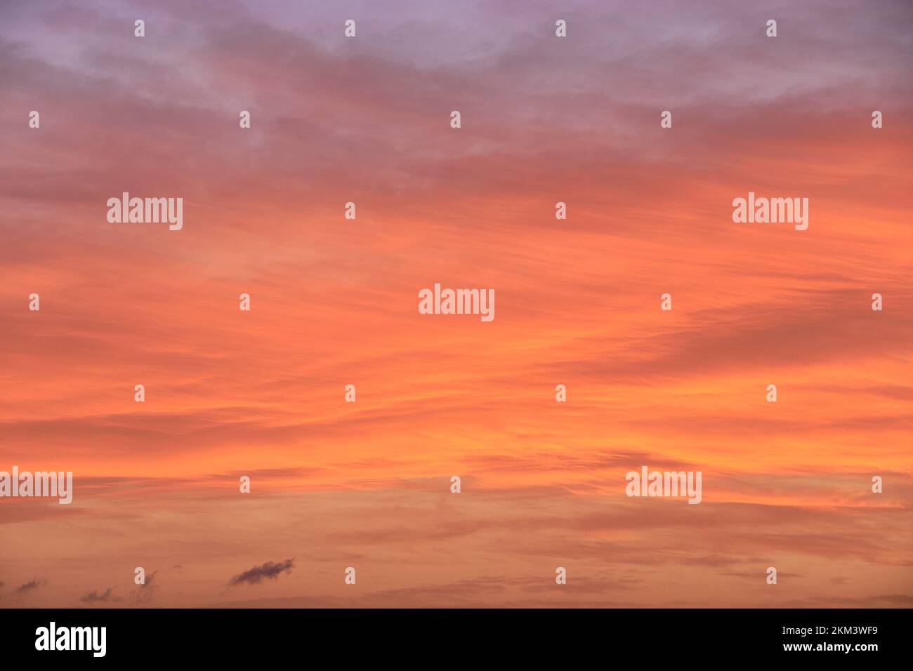 Sunset. Heaven, orange sky Sun rays Wallpaper Clouds Stock Photo - Alamy