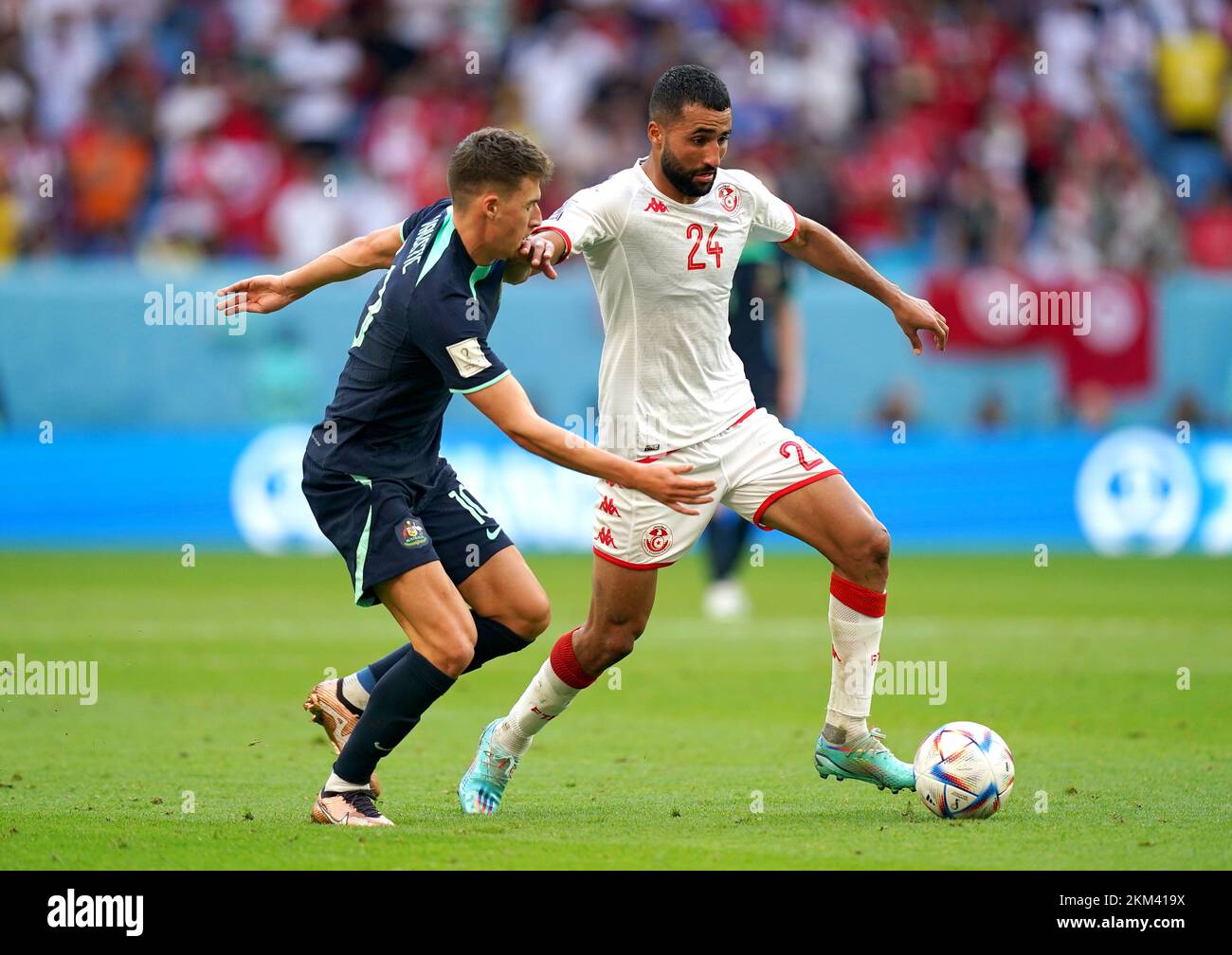 Tunisia's Ali Abdi (right) and Australia's Ajdin Hrustic battle for the ...