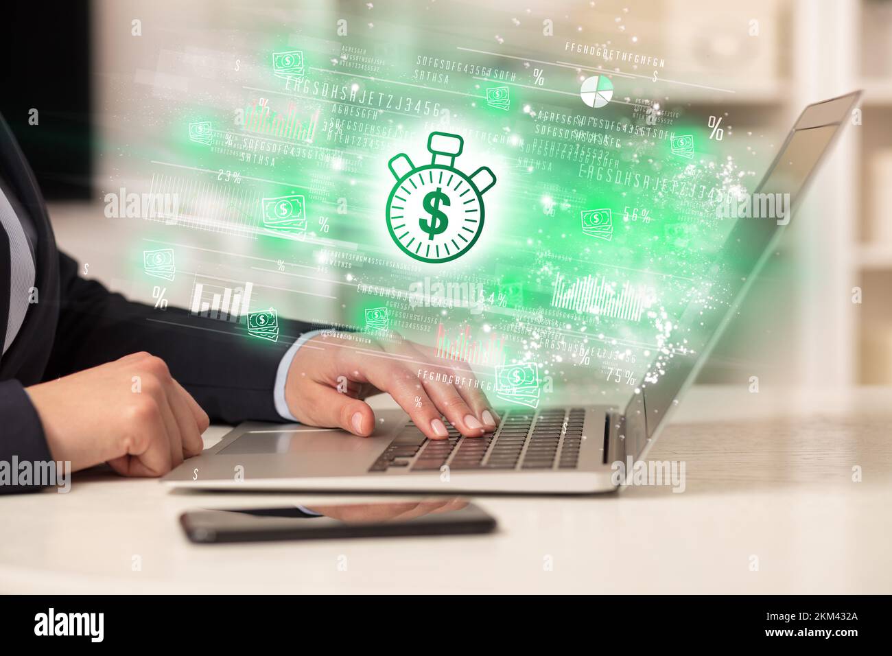 Young man watching stock market on laptop Stock Photo - Alamy