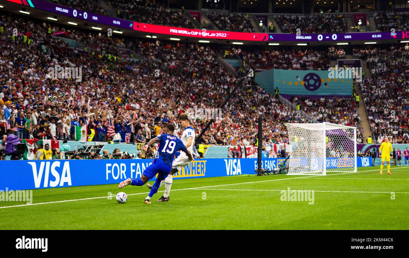 Doha, Qatar. 25th Nov, 2022. Haji Wright (USA), John Stones (England) England - USA World Cup ...
