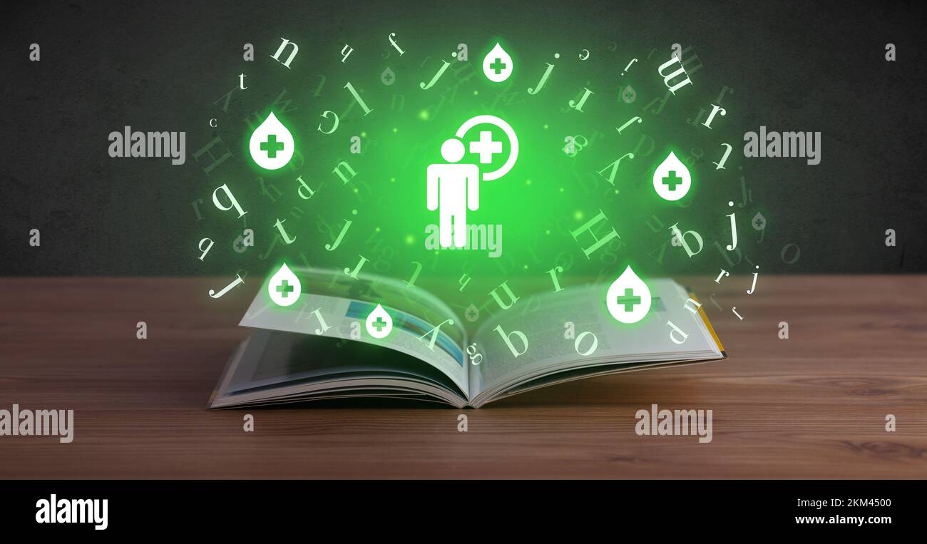 Open medical book with health icons above Stock Photo - Alamy