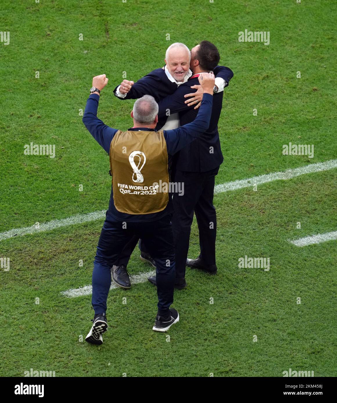 Australia manager Graham Arnold celebrates with his staff following ...