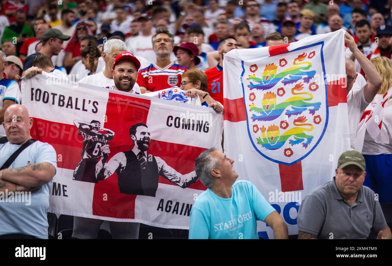 Doha, Qatar. 25th Nov, 2022. English fans with rainbow flag England ...
