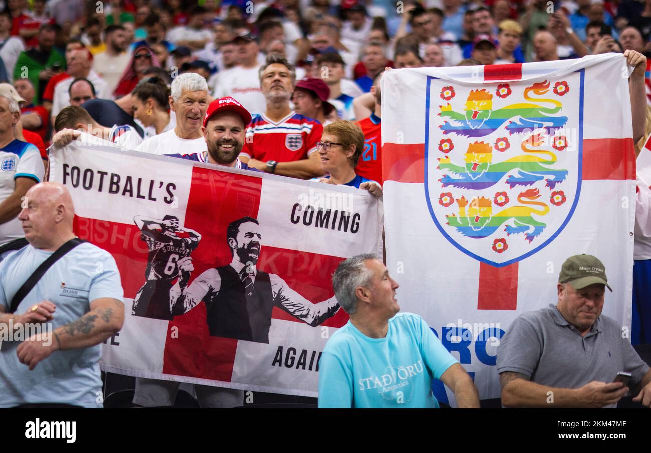 Doha, Qatar. 25th Nov, 2022. English fans with rainbow flag England ...