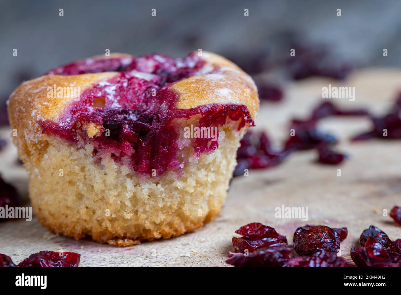 wheat pastries with red cherry strawberry filling on a board, dried ...