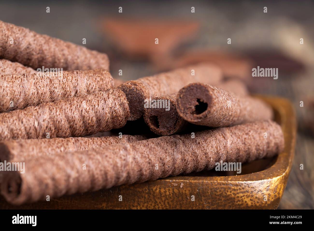 chocolate tubes with chocolate filling, dessert of chocolate waffle ...