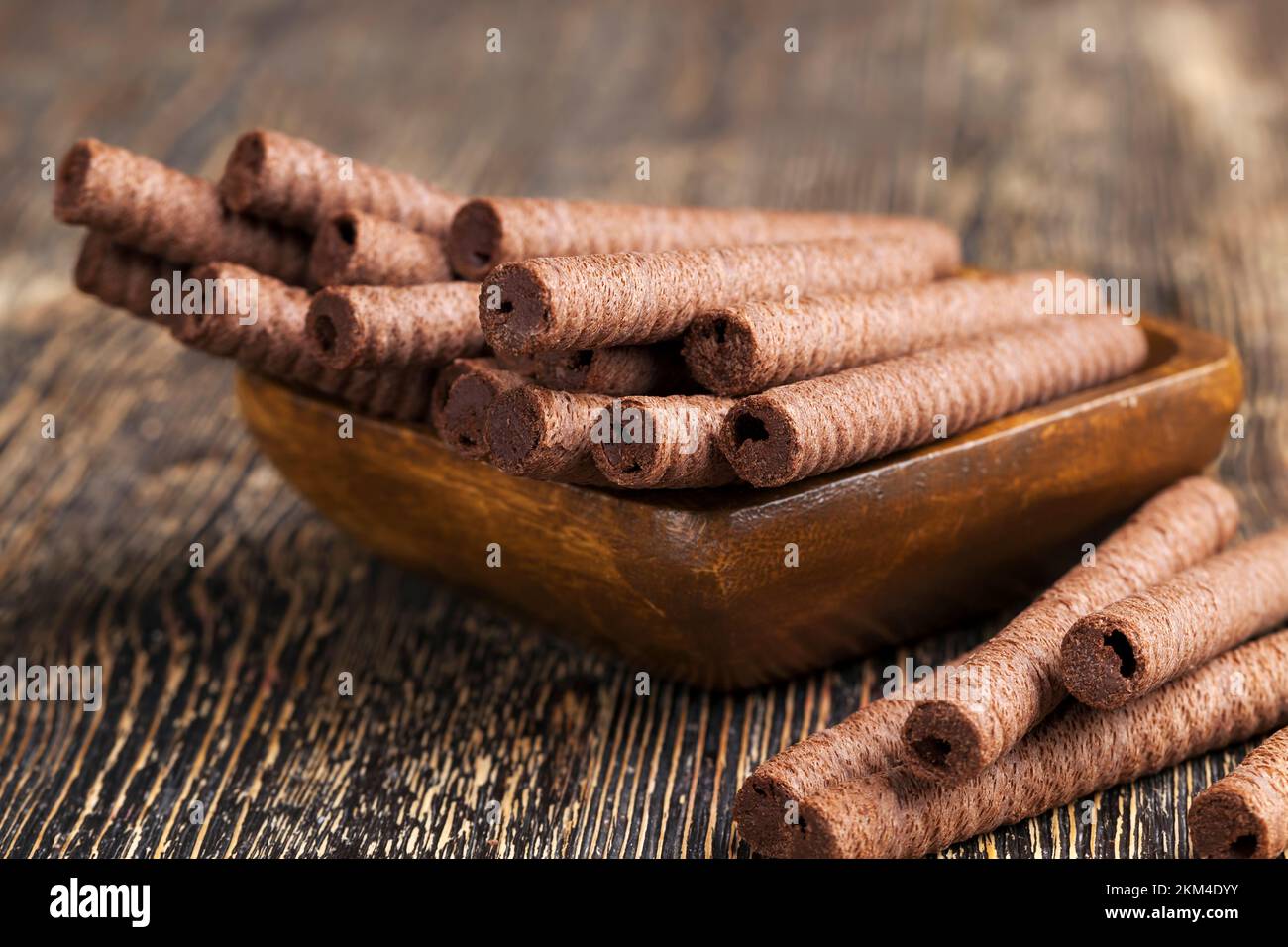 chocolate tubes with chocolate filling, dessert of chocolate waffle ...