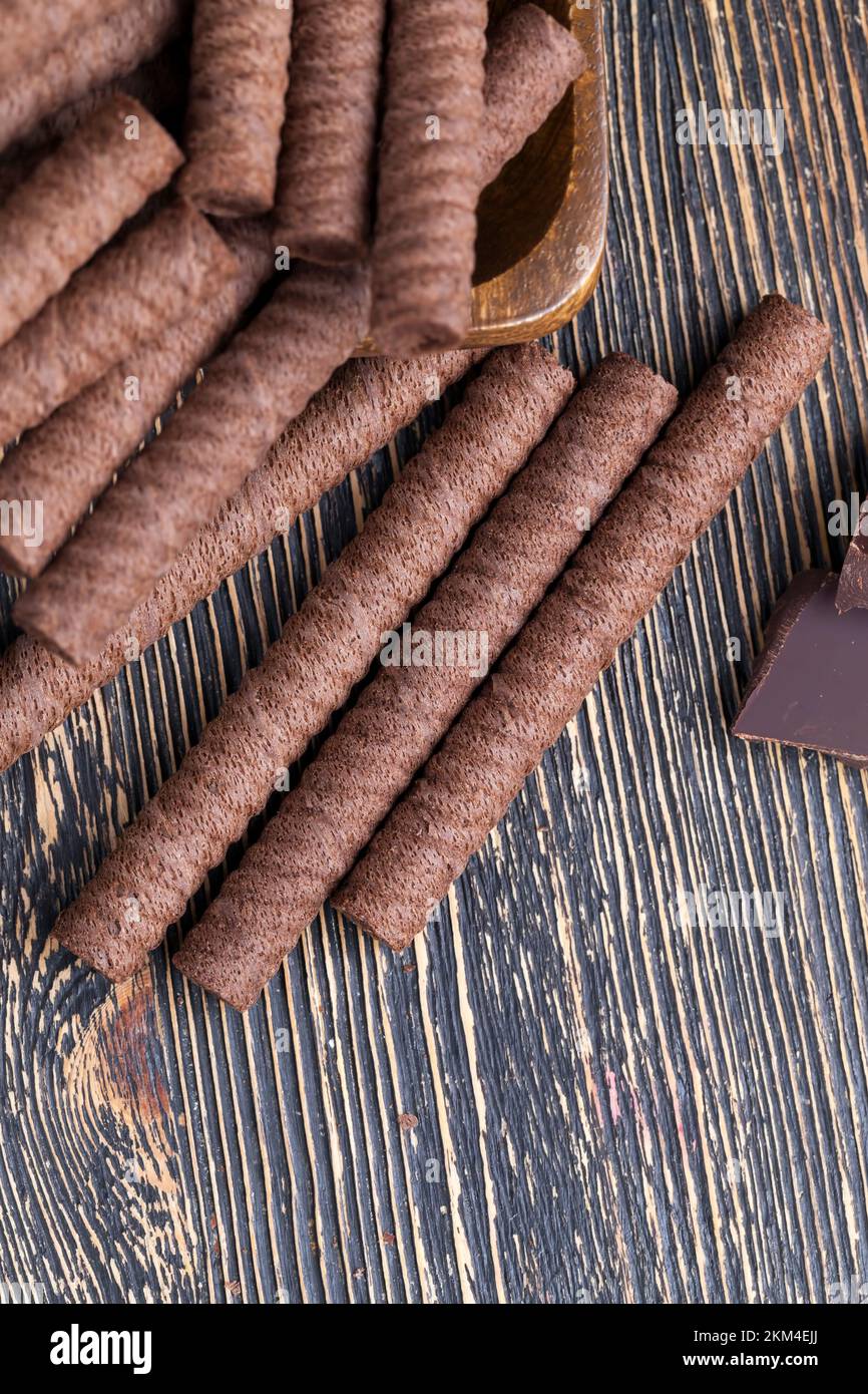 chocolate tubes with chocolate filling, dessert of chocolate waffle ...