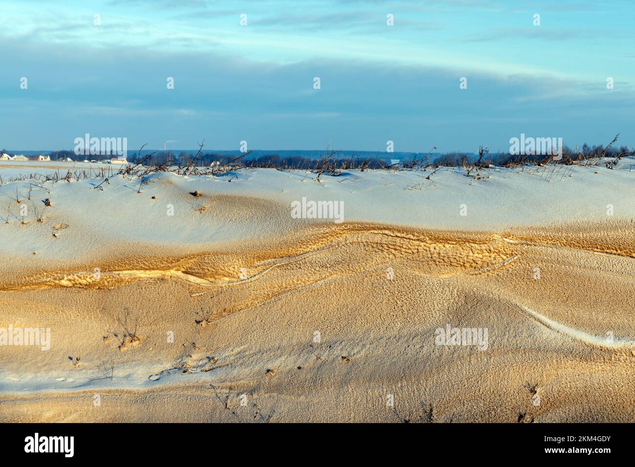 snow covered with a thick layer of dirt and dust in the winter season ...