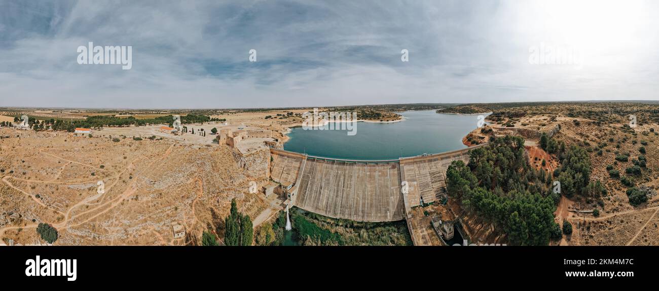 An aerial panoramic of lake El Embarcadero beside Pennarroya castle in ...