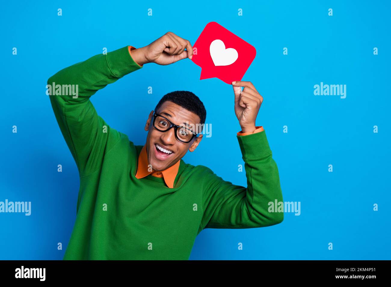 Photo of young funky man wear green jumper gentleman eyeglasses hold ...