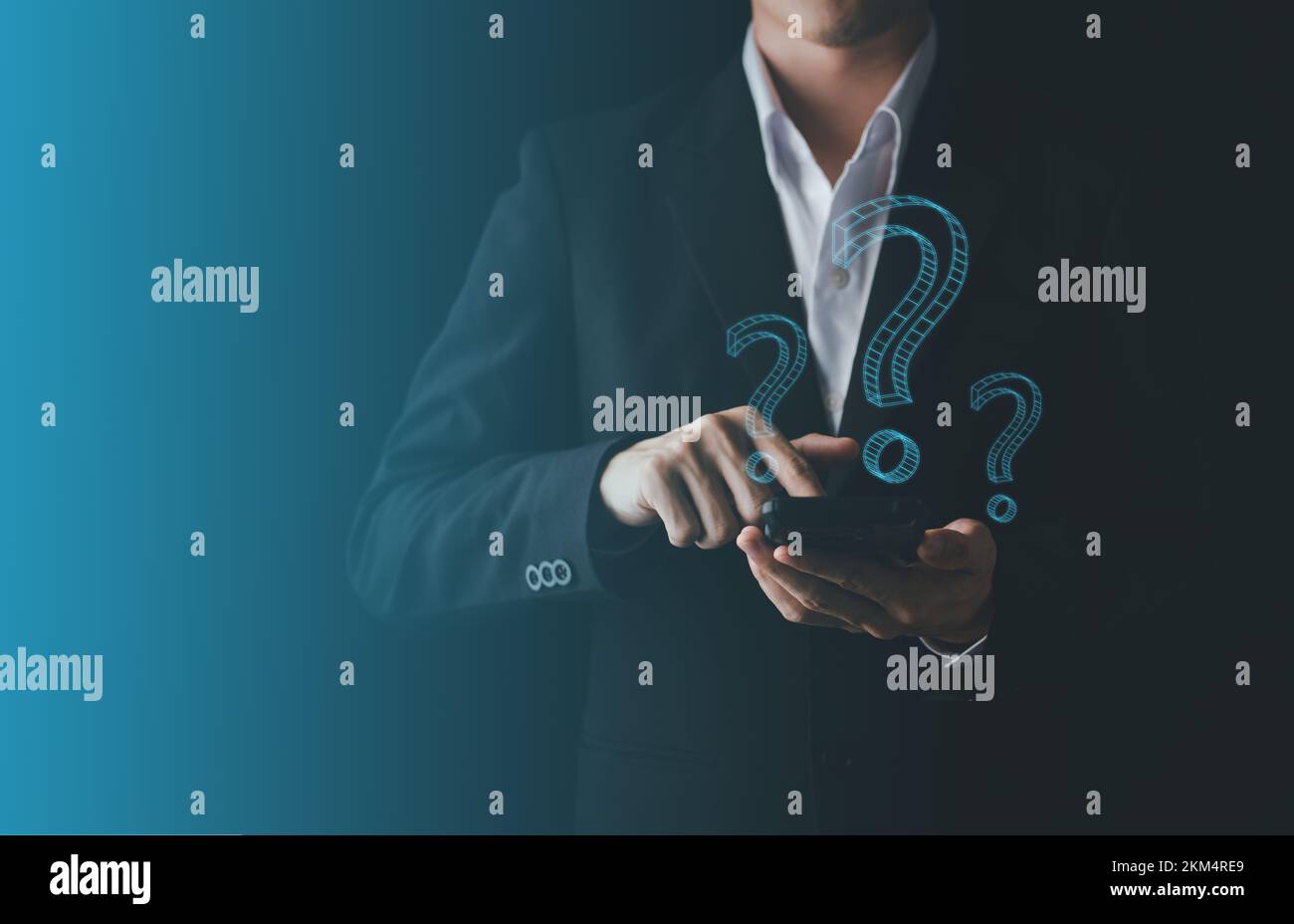Question mark symbol with businessman hand hold smartphone. Thinking ...
