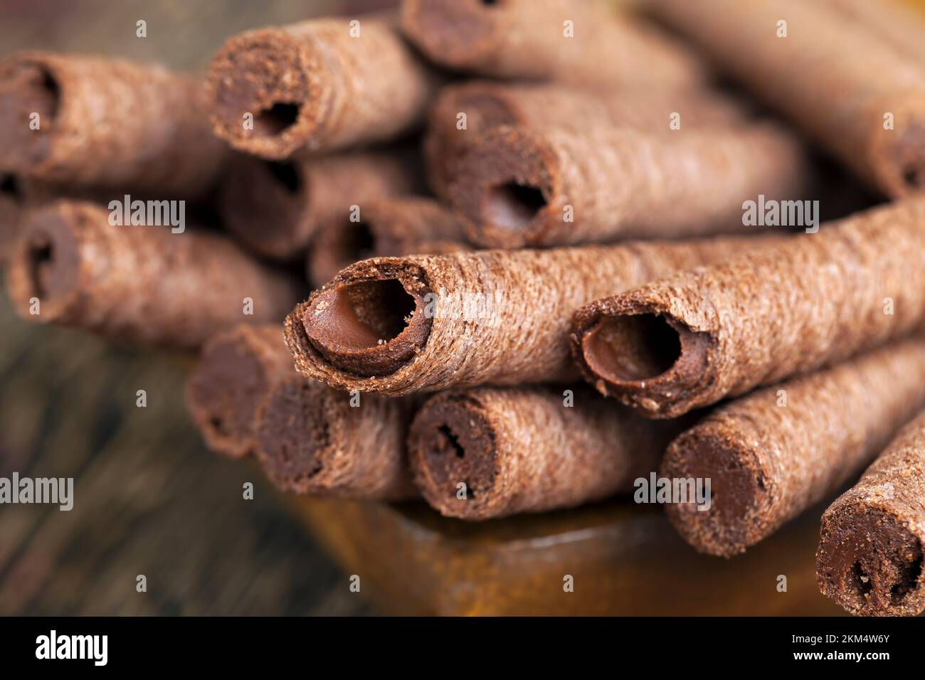 chocolate tubes with chocolate filling, dessert of chocolate waffle ...