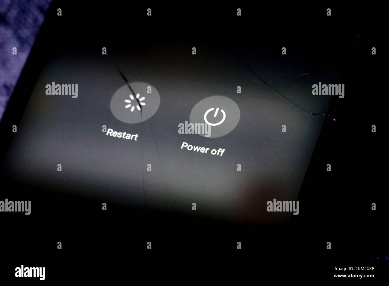 Close-up view of smartphone on off restart icons Stock Photo - Alamy