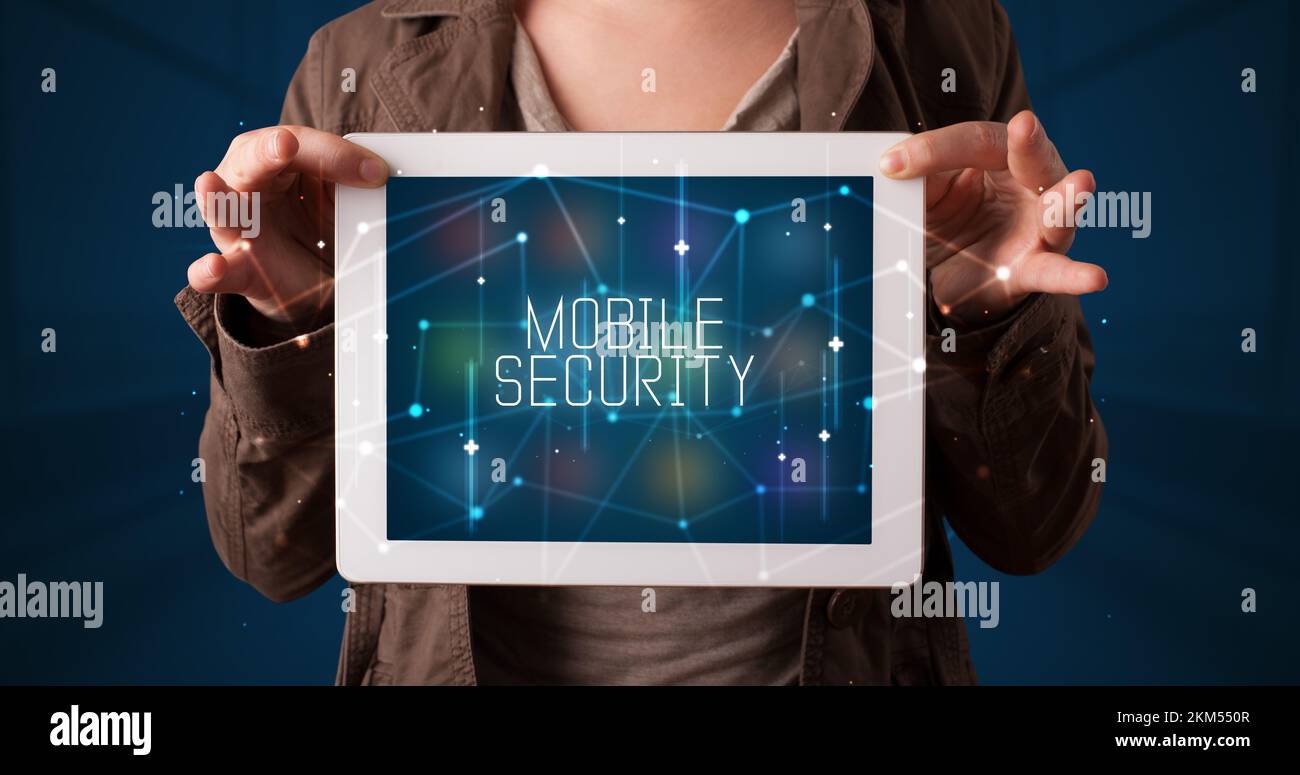 Person holding tablet, security concept Stock Photo - Alamy