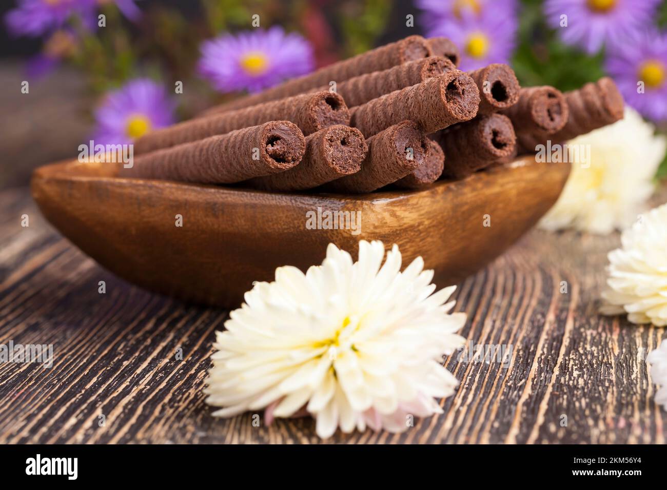 chocolate tubes with chocolate filling, dessert of chocolate waffle ...