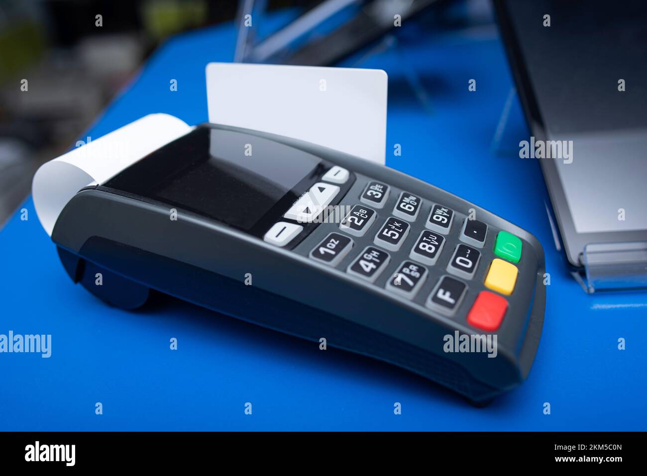 Bank terminal and payment card Stock Photo - Alamy
